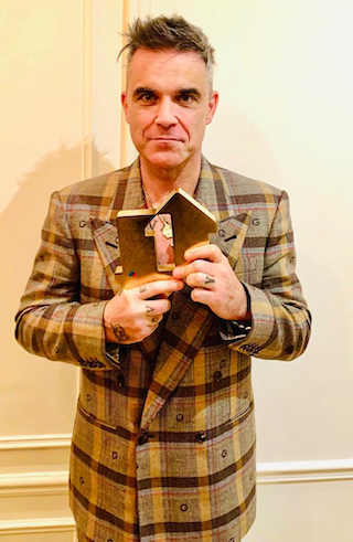 U.K. CHARTS: ROBBIE MAKES HISTORY