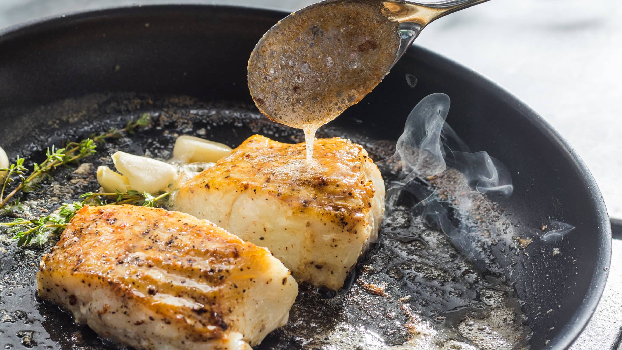 Butter-Basted Fish Fillets with Garlic and Thyme | Cook's Illustrated