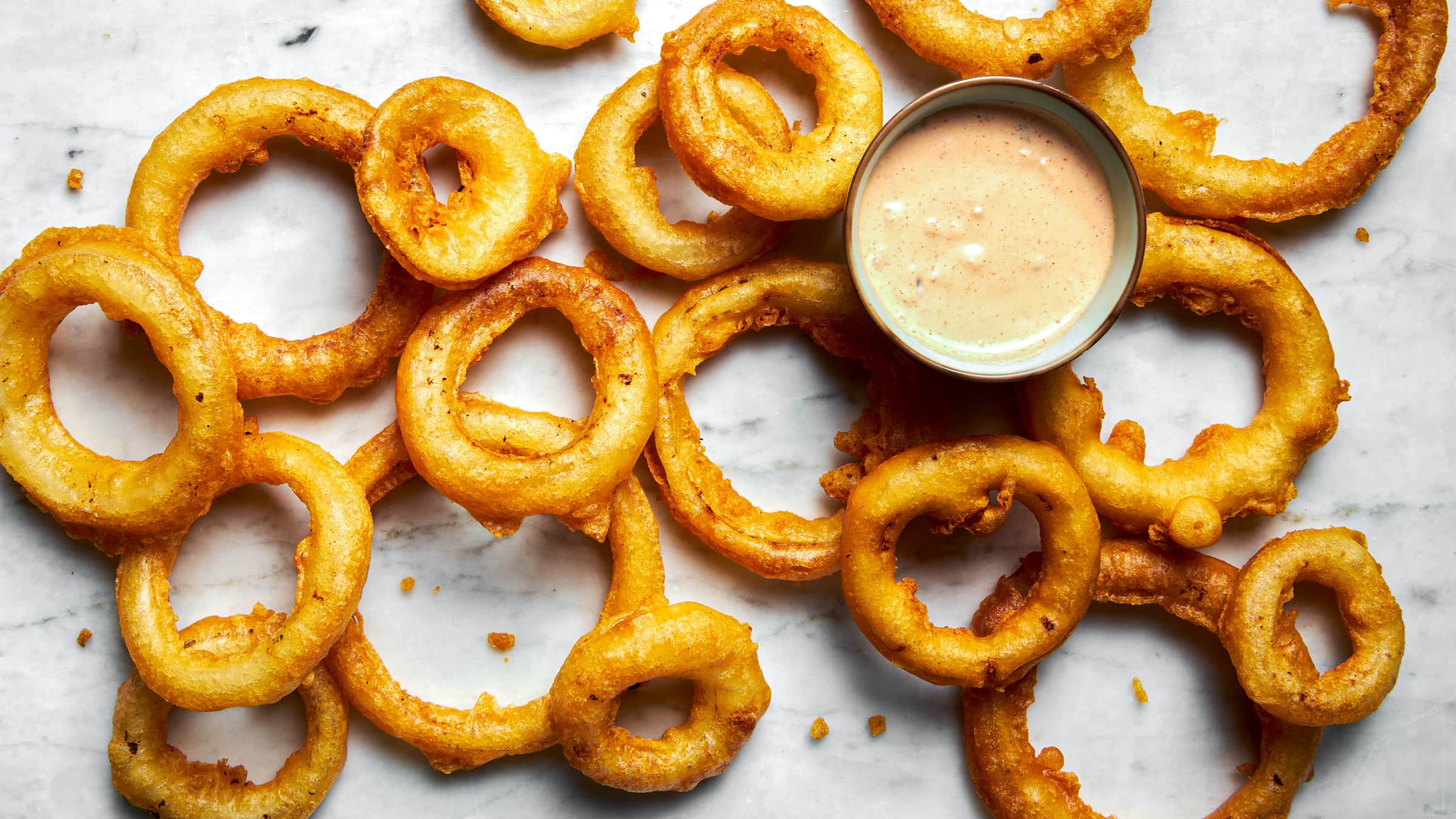 Beer-Battered Onion Rings with Jalapeño Dipping Sauce | Cook's Illustrated