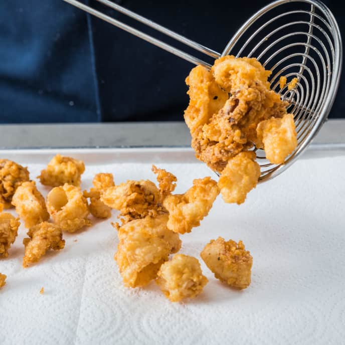 How to Fry Golden, Ultracrispy Fried Calamari | America's Test Kitchen