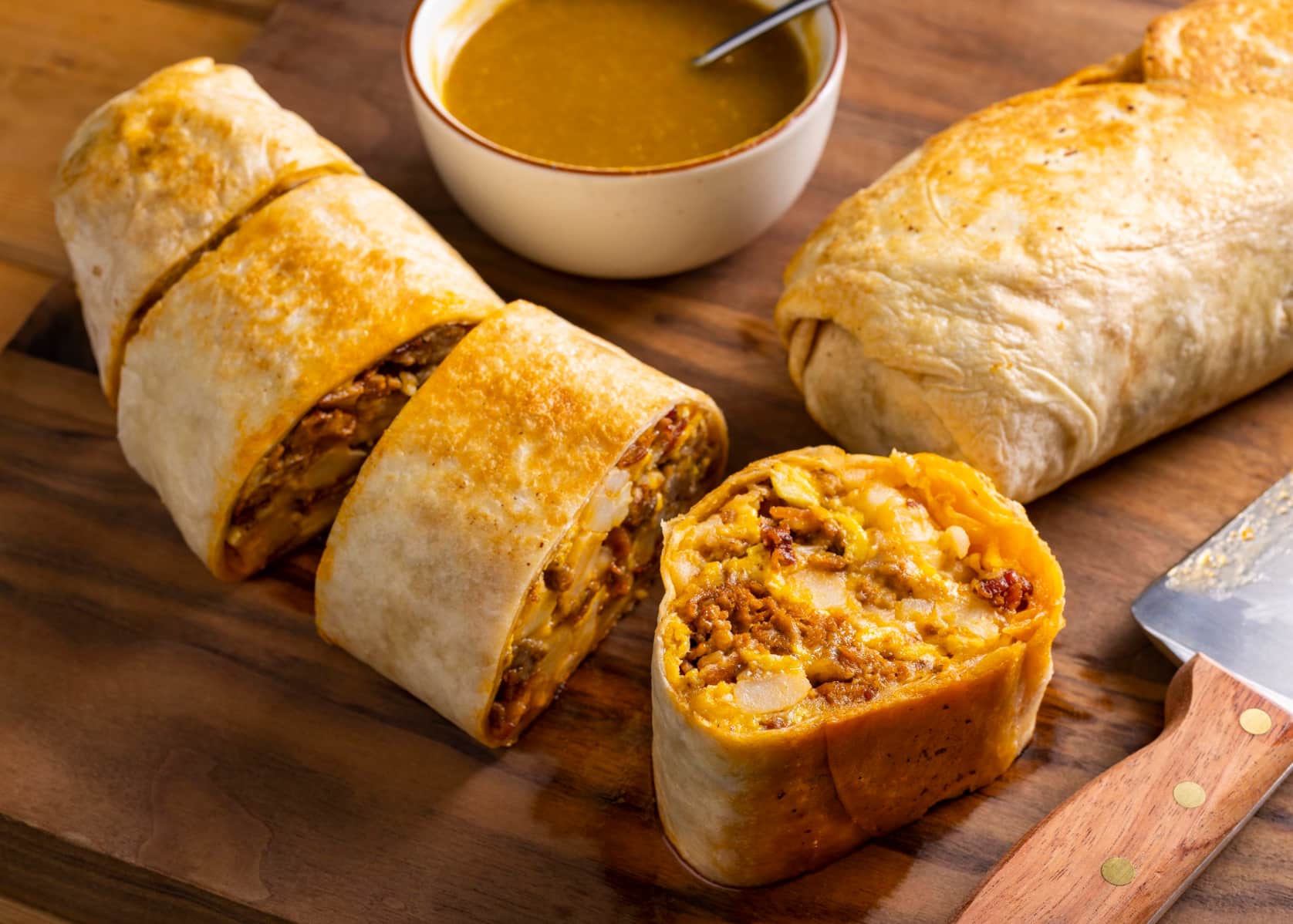 Loaded Three-Meat Breakfast Burritos | America's Test Kitchen