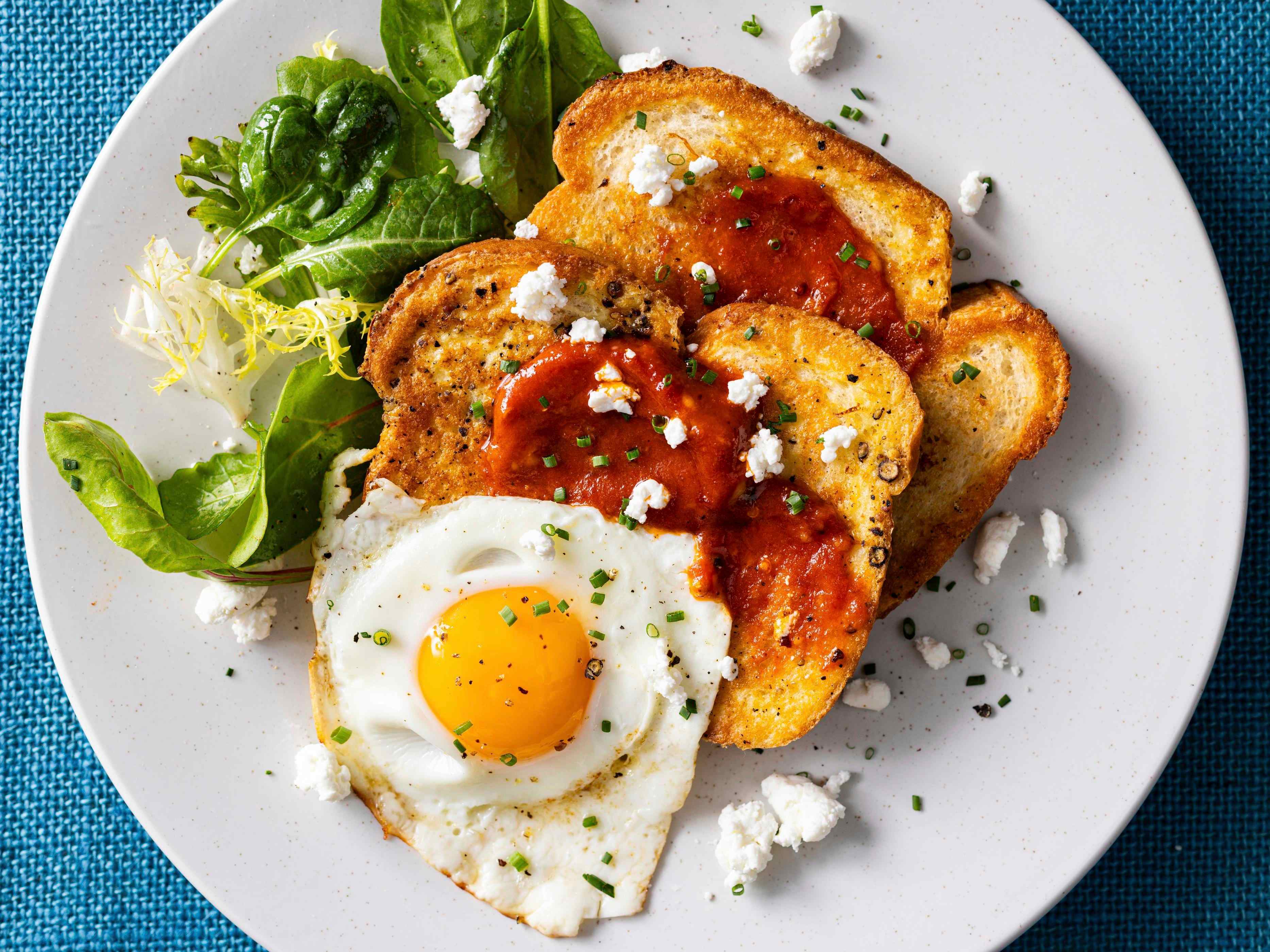 Savory French Toast with Tomato Butter and Fried Eggs | America's Test ...