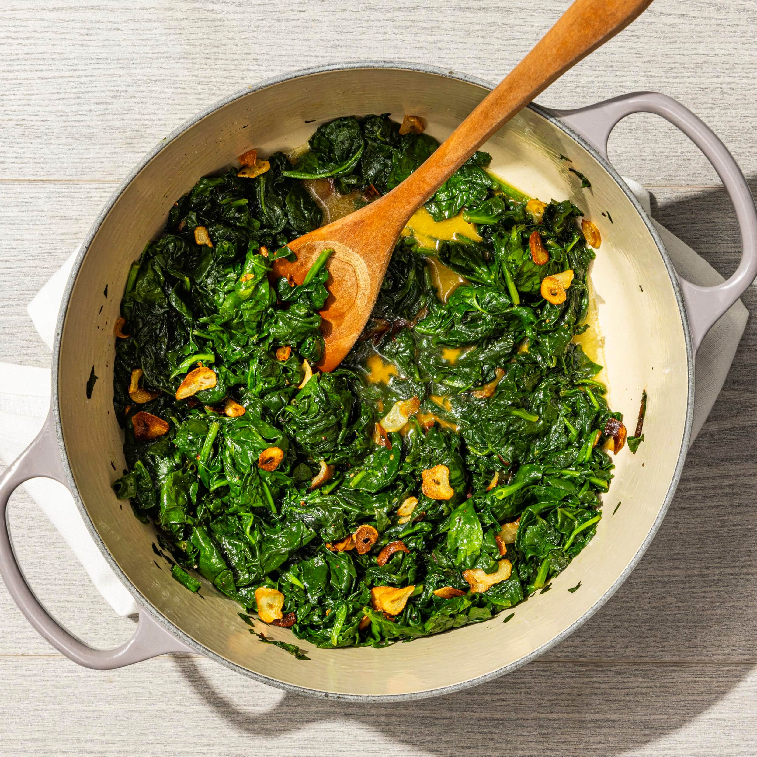Spinach with Garlic Chips and Pepper Flakes | America's Test Kitchen