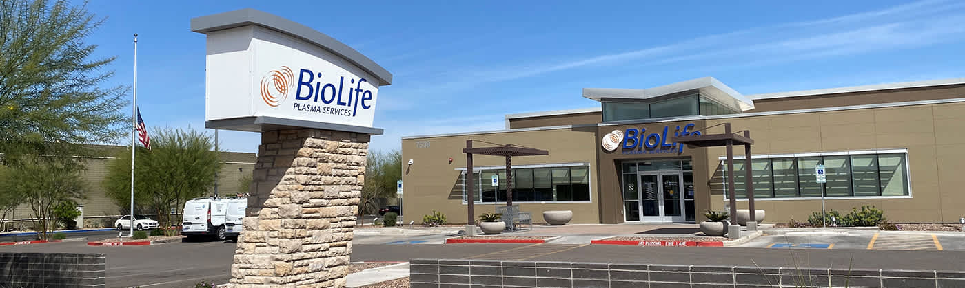 Parking lot view of unique sign and BioLife Plasma Services plasma ...
