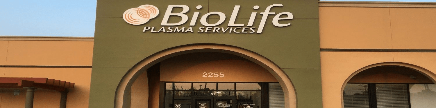 Green front entrance sign of BioLife Plasma Services plasma donation ...