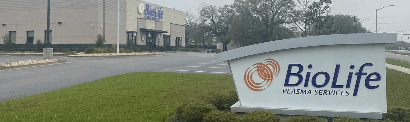 BioLife Plasma Services sign with plasma donation center in background ...