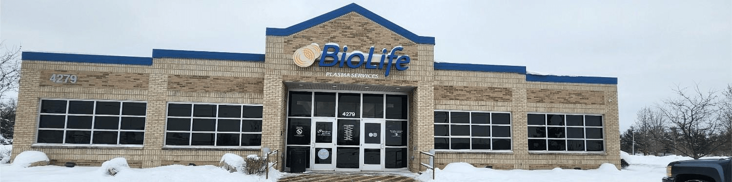 Vibrant front entrance sign of BioLife Plasma Services plasma donation ...