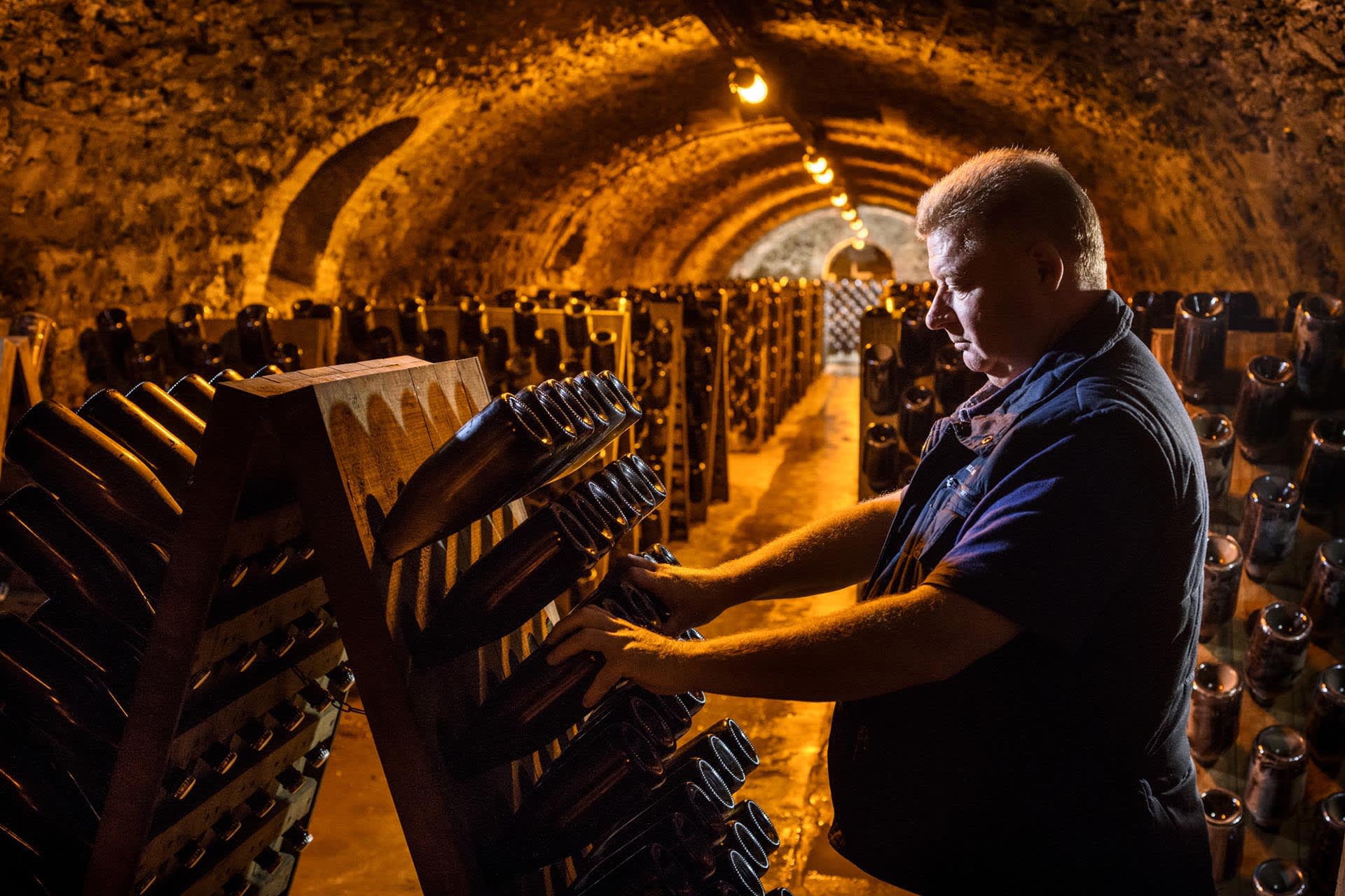 What Does 'Riddling' Mean in Wine? | Wine Enthusiast