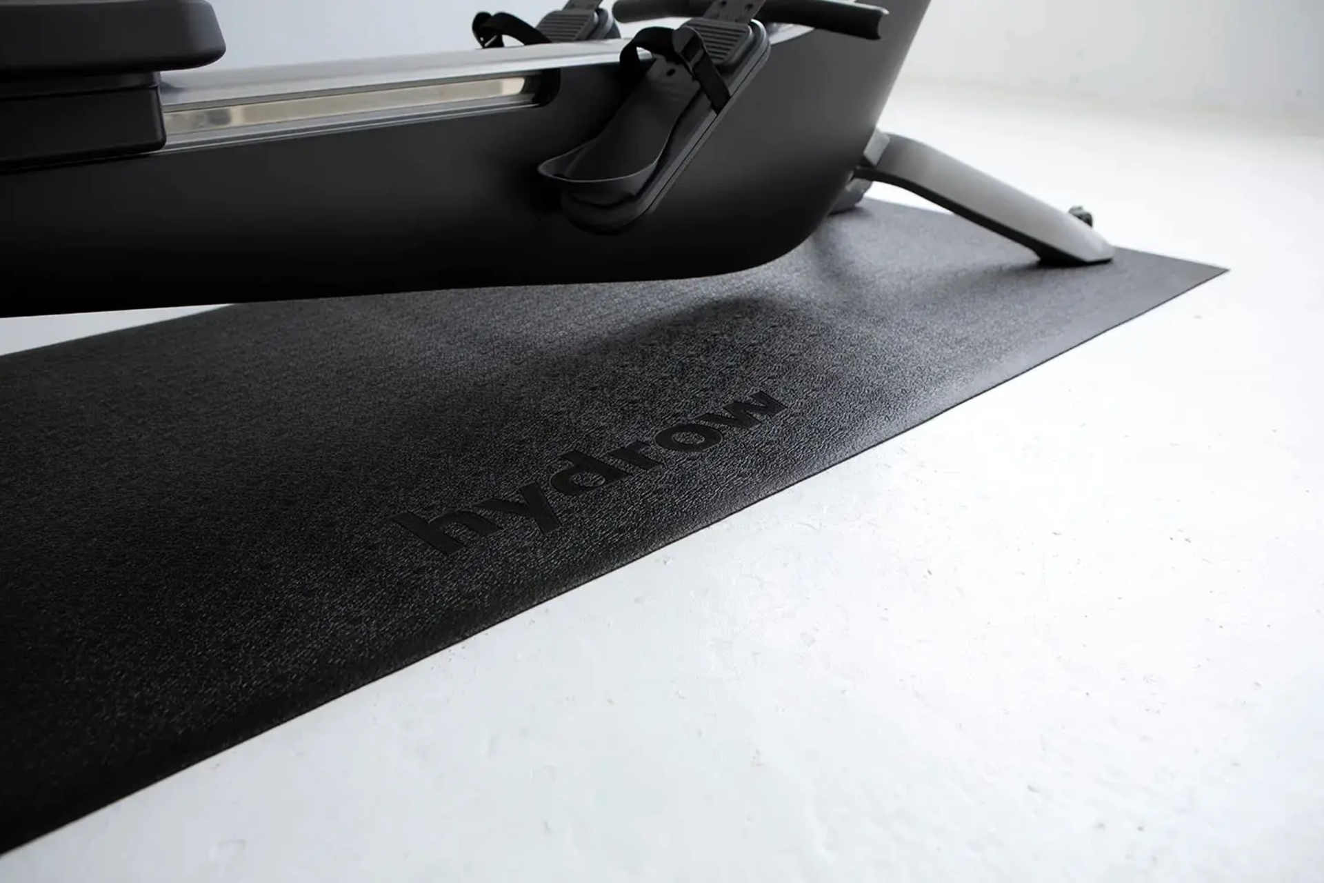 Do You Really Need a Rowing Machine Mat? Here’s Why It Might Be Worth ...
