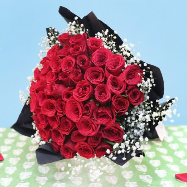 Order Hot Roses bouquet of 50 roses online | free delivery in 3 hours ...