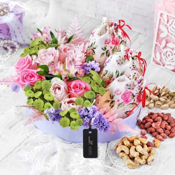 Blooming Surprise Hamper: Order Anniversary Flowers Online | Interflora ...