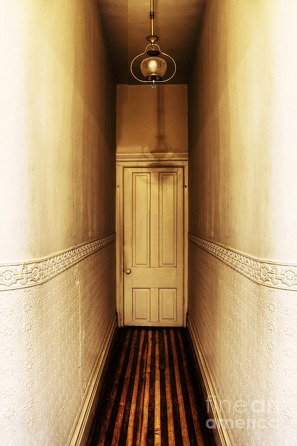 Long Hallway With Door At The End
