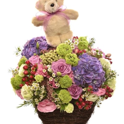 Arrangement of cut flowers with Teddy Bear | Interflora