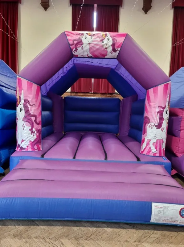 Purple And Blue Unicorn Bouncy Castle Inflatable and Soft Play Hire Redcar