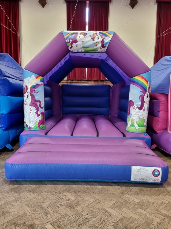 Purple And Blue Rainbow Unicorn Bouncy Castle Inflatable and Soft Play ...