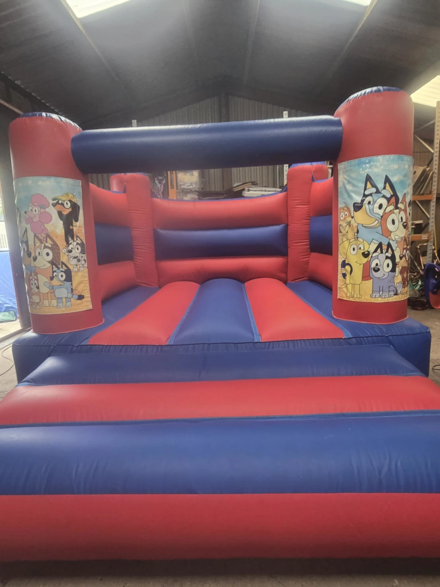 Bluey Red And Blue H Frame Bouncy Castle - Tiny Tots Inflatables