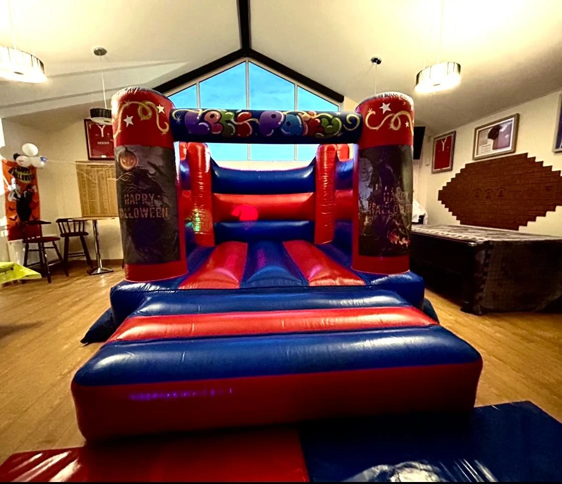 Red And Blue Small Castle Halloween Bouncy Bees Bouncy Castle Hire