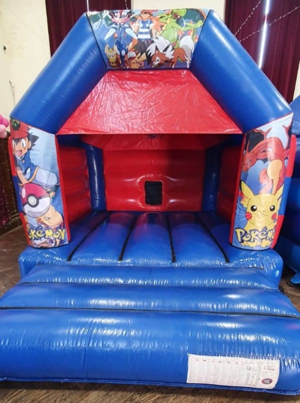 Blue And Red Pokemon Bouncy Castle Inflatable and Soft Play Hire Redcar