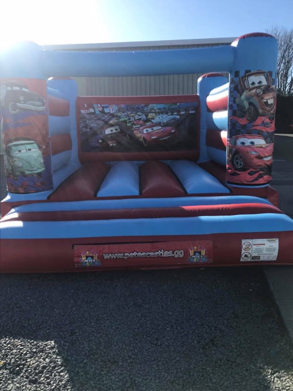 Red And Blue Cars Castle - Island Castles | Inflatable Hire Guernsey