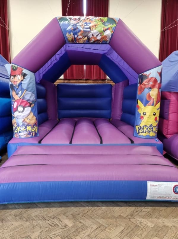 Purple And Blue Pokemon Bouncy Castle Inflatable and Soft Play Hire Redcar