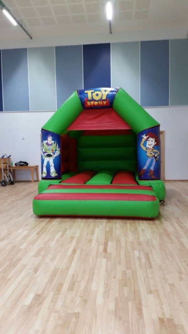 Green Toy Story Castle - Bouncy Castle Hire Manchester - Jump In Castles
