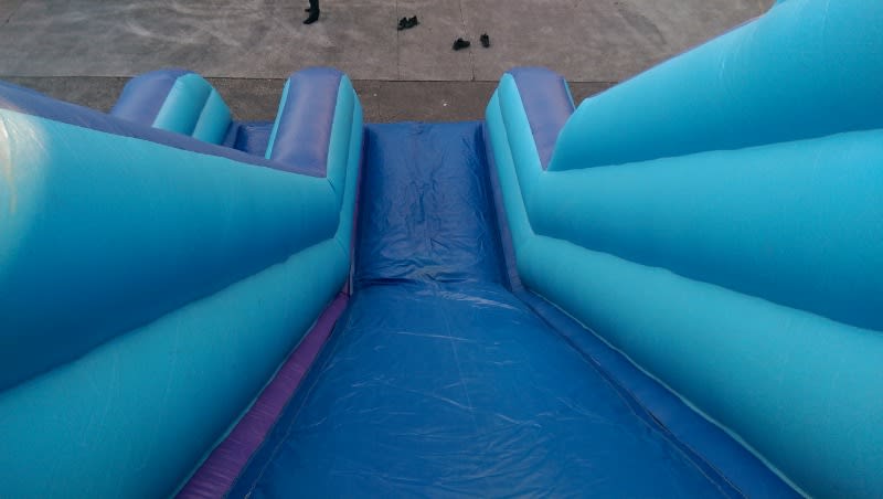 Blue Inflatables Slide For Hire In Liverpool - MJ Castles