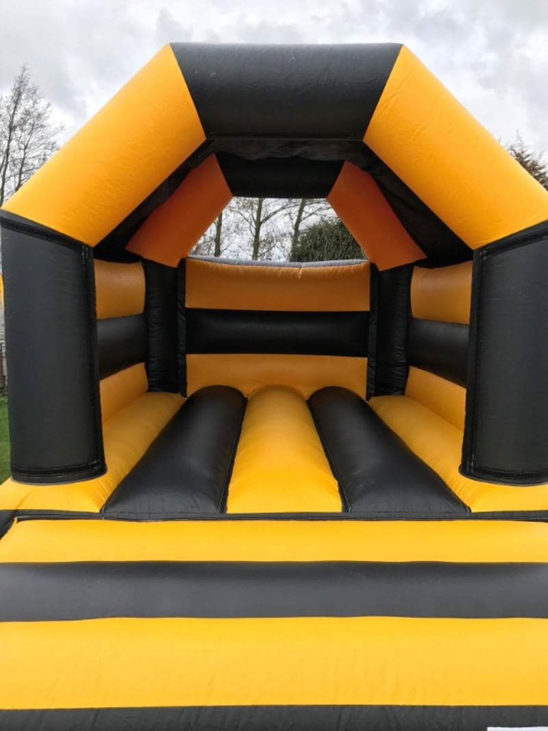 Black And Yellow Castle Bouncy Castles and Rodeo Bull Hull - Bouncy ...