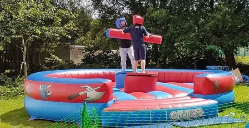 Inflatable Gladiator Duel - Bounceland Uk, Bouncy Castle Hire Cardiff ...