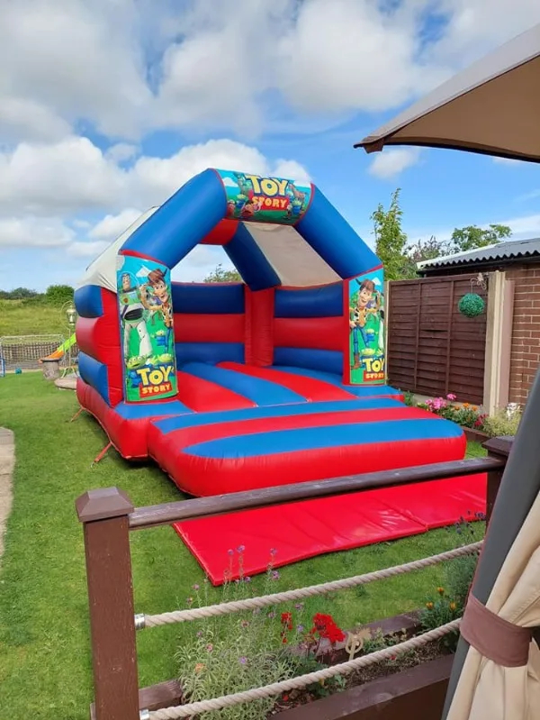 Red And Blue Toy Story Castle - Bouncy Castle Hire in Peterborough ...