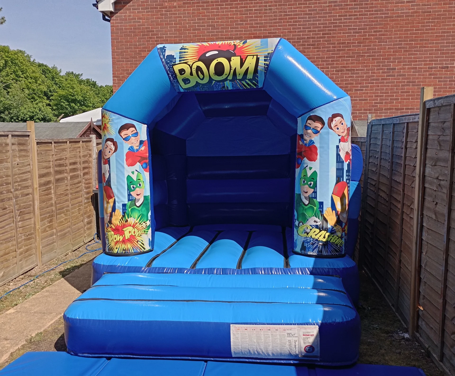 Junior Superhero Blue Castle - Dino Tots Bouncy Castle & Soft Play Hire