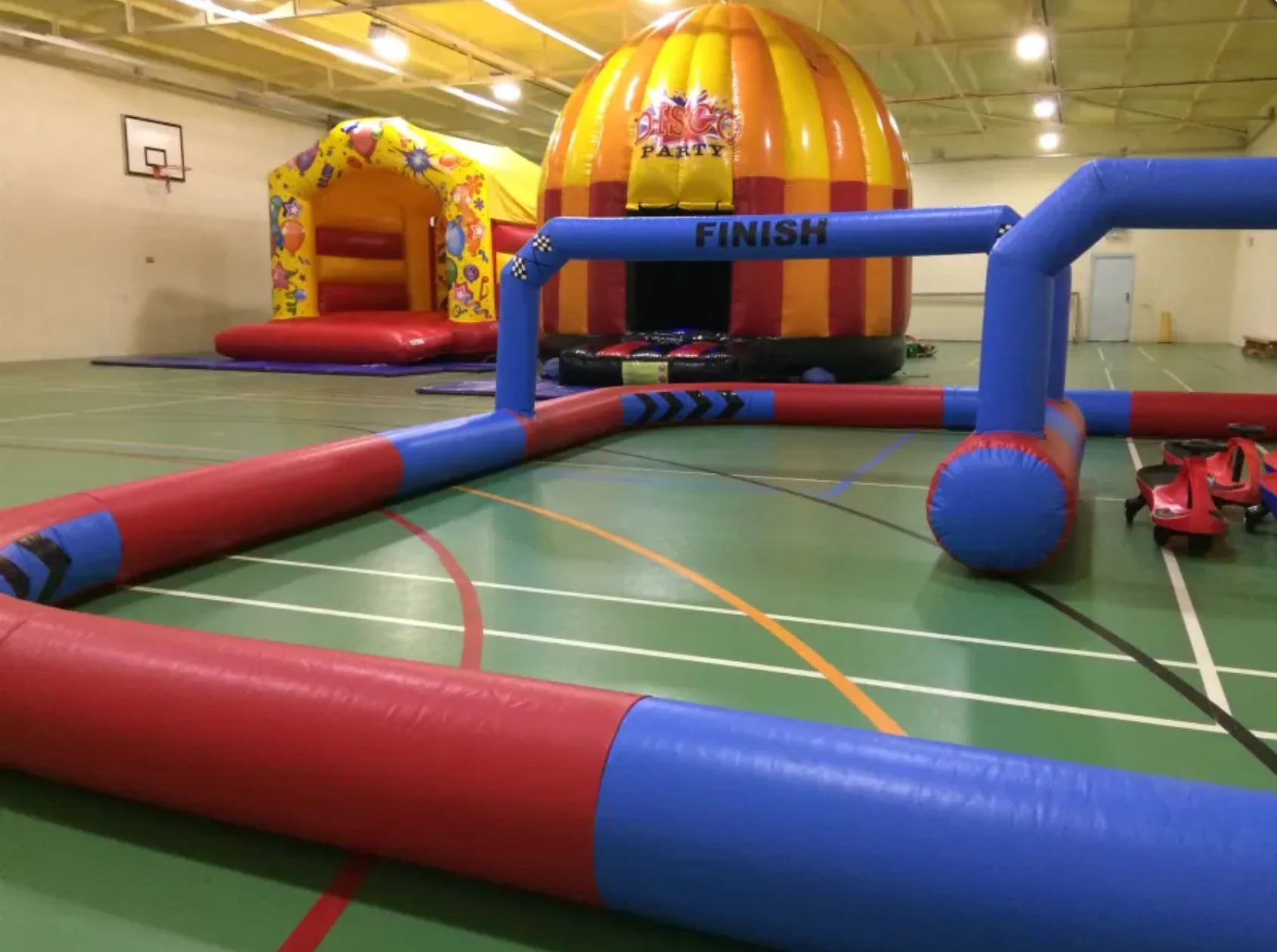 Large Disco Dome Bouncy Castle Didi Car Racing Track - Dorset Entertainment