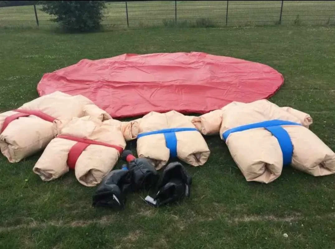 Adult And Children Sumo Suits And Hats - Kathryns Kastles and Soft Play