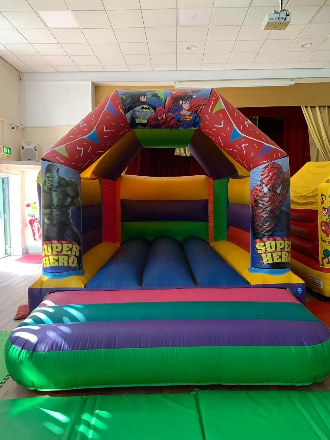 Superhero Bouncy Castle - Kids Kingdom Cearphilly