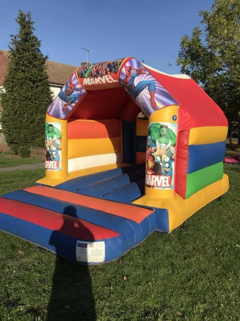Marvel Themed Muiti Colour Bouncy Castle - Chambers Bouncy Castle Hire