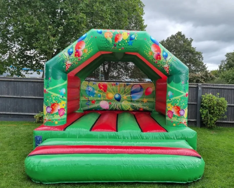 Green And Red Party Time Bouncy Castle Hire Bury St Edmunds