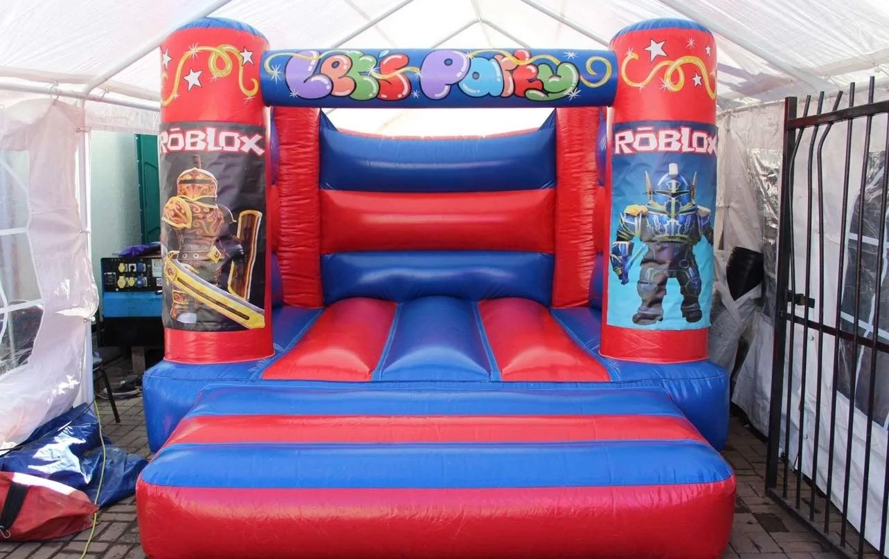 Red And Blue Small Castle Cars Bouncy Bees Bouncy Castle Hire