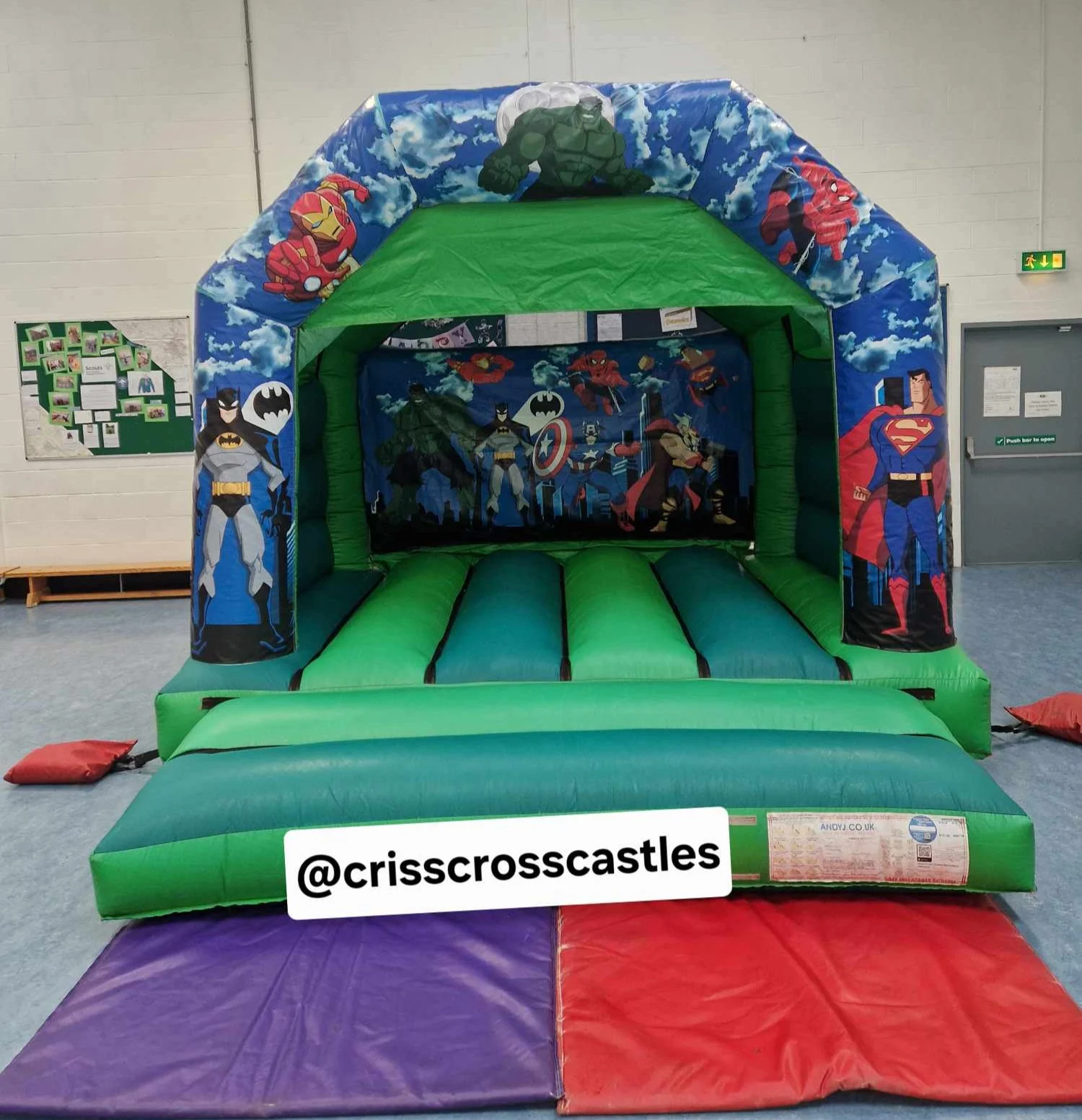 12ftx12ft Superhero Themed Green Bouncy Castle - Criss Cross Castles