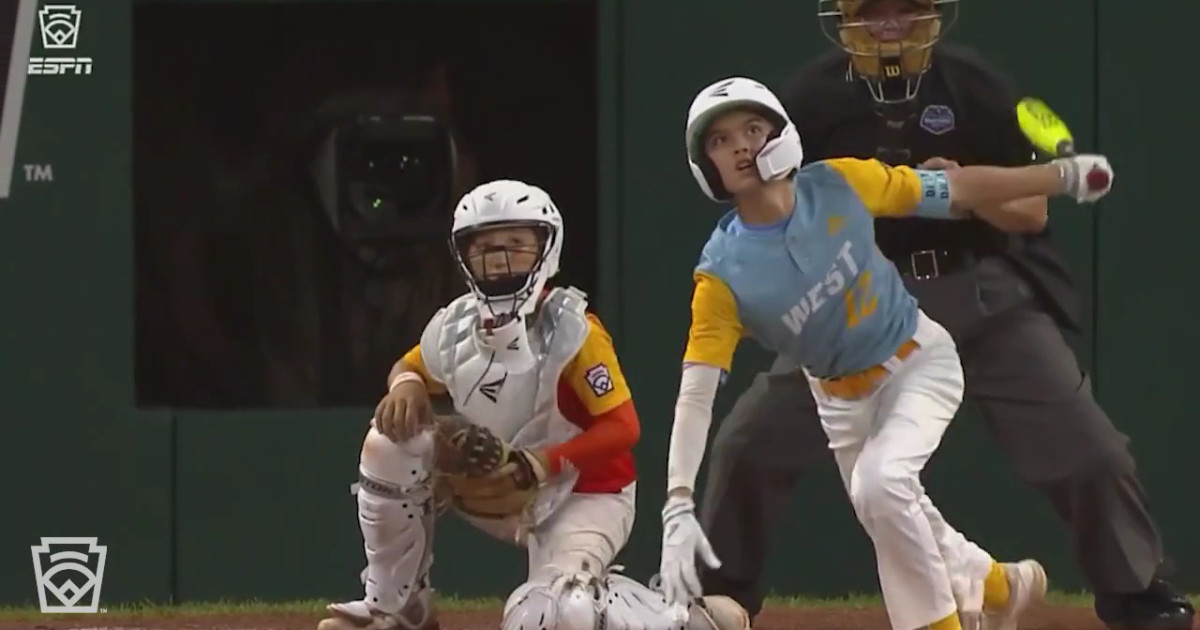 Daly Watson slams a two-run Homer. - Little League