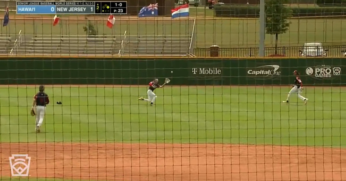 Kyle Fisher makes a sliding grab - Little League