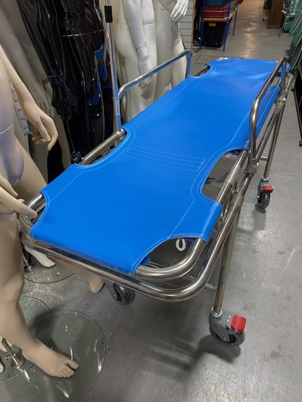 Blue Medical/Ambulance Adjustable Stretcher On Wheels | LONDON PROP HIRE