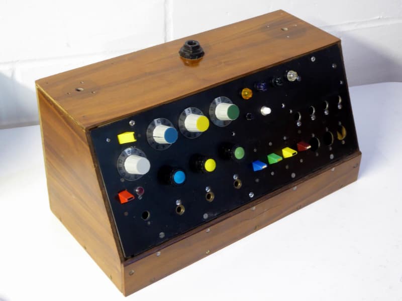 Home-made looking, wooden sloping front, switch & knob control console ...