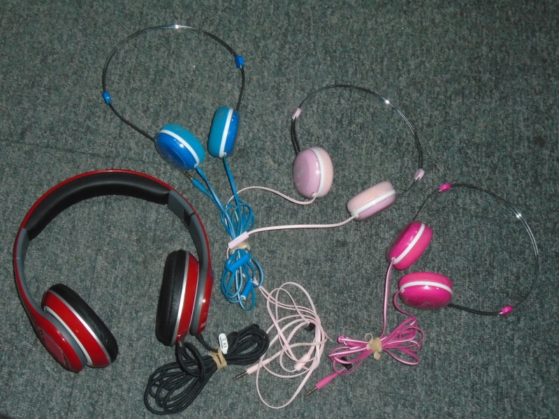 Selection of brightly coloured headphones | Electro Props Hire
