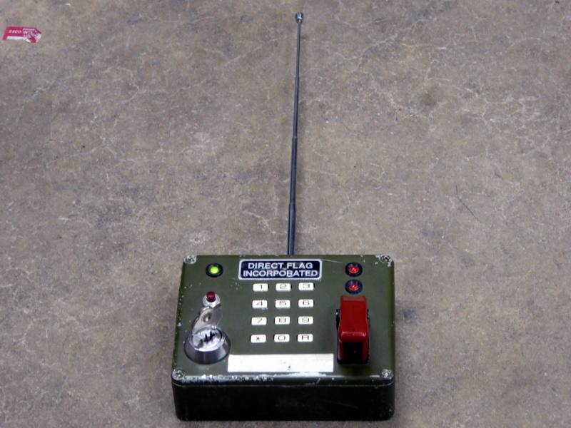 Practical khaki radio detonator/remote control with LEDs, keyswitch ...