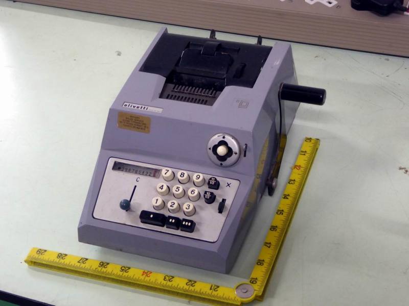 Period Olivetti hand cranked mechanical calculator | Electro Props Hire