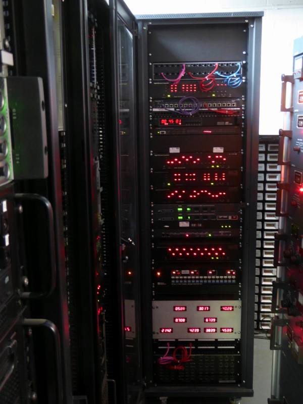 Tall black practical server rack with smoked glass front. | Electro ...
