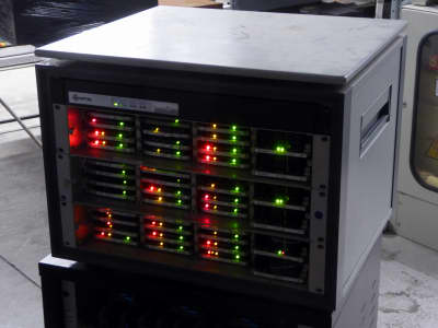 Practical hitech server disk array panel with multiple coloured winking ...