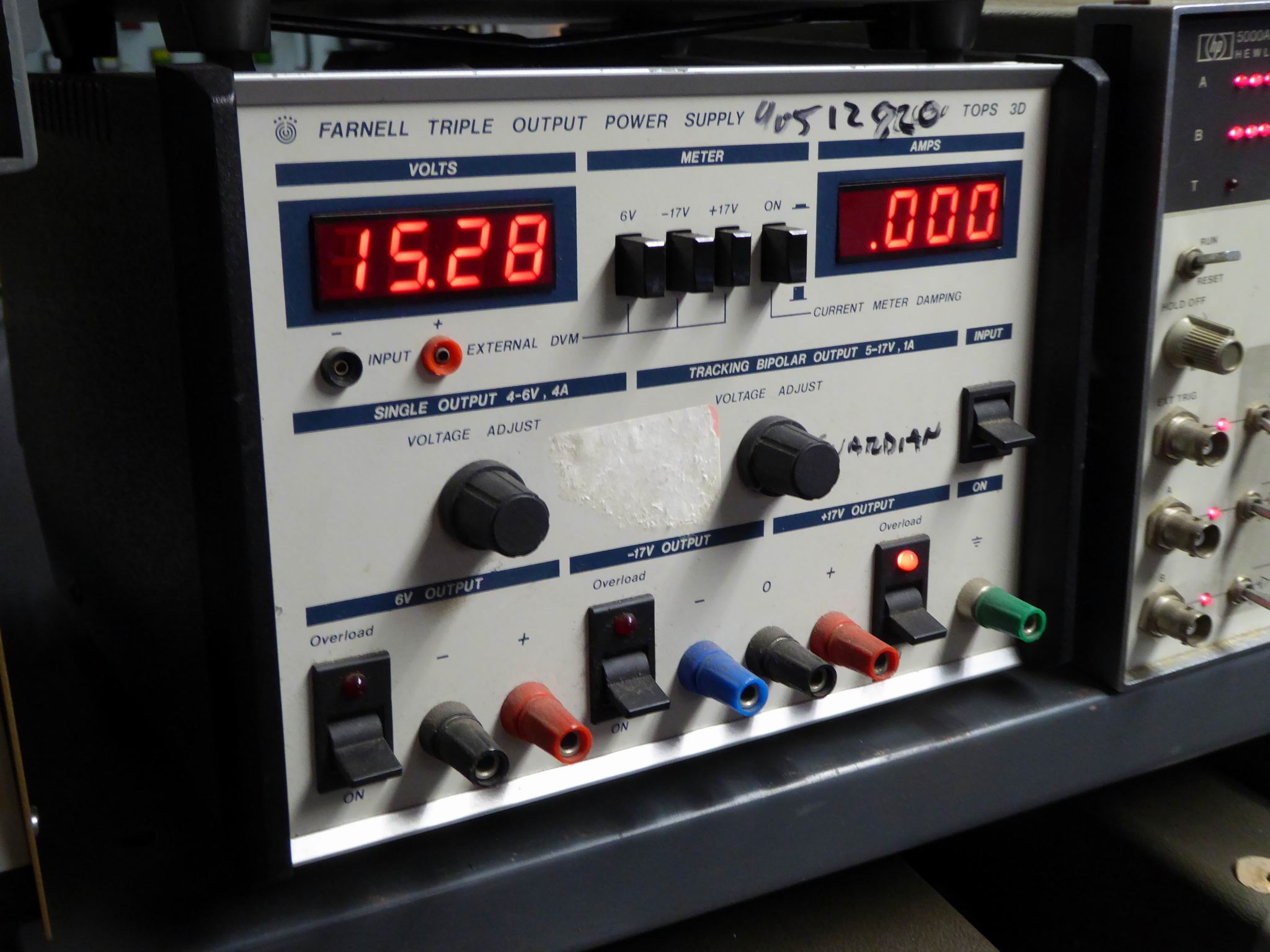 Practical laboratory Farnell triple power supply with bold red numbers ...