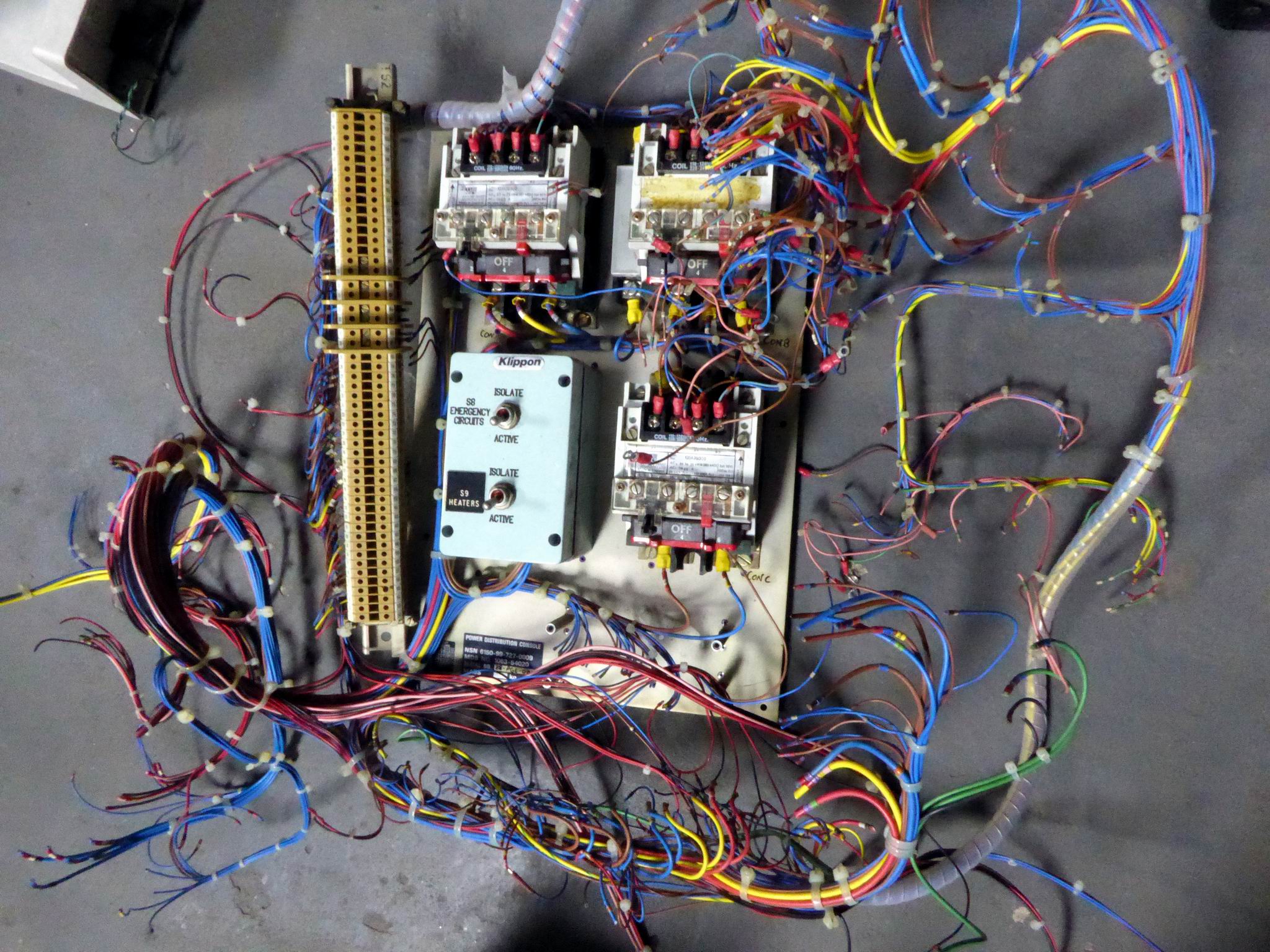 Contents of electrical control box with wiring loom, terminal strip ...