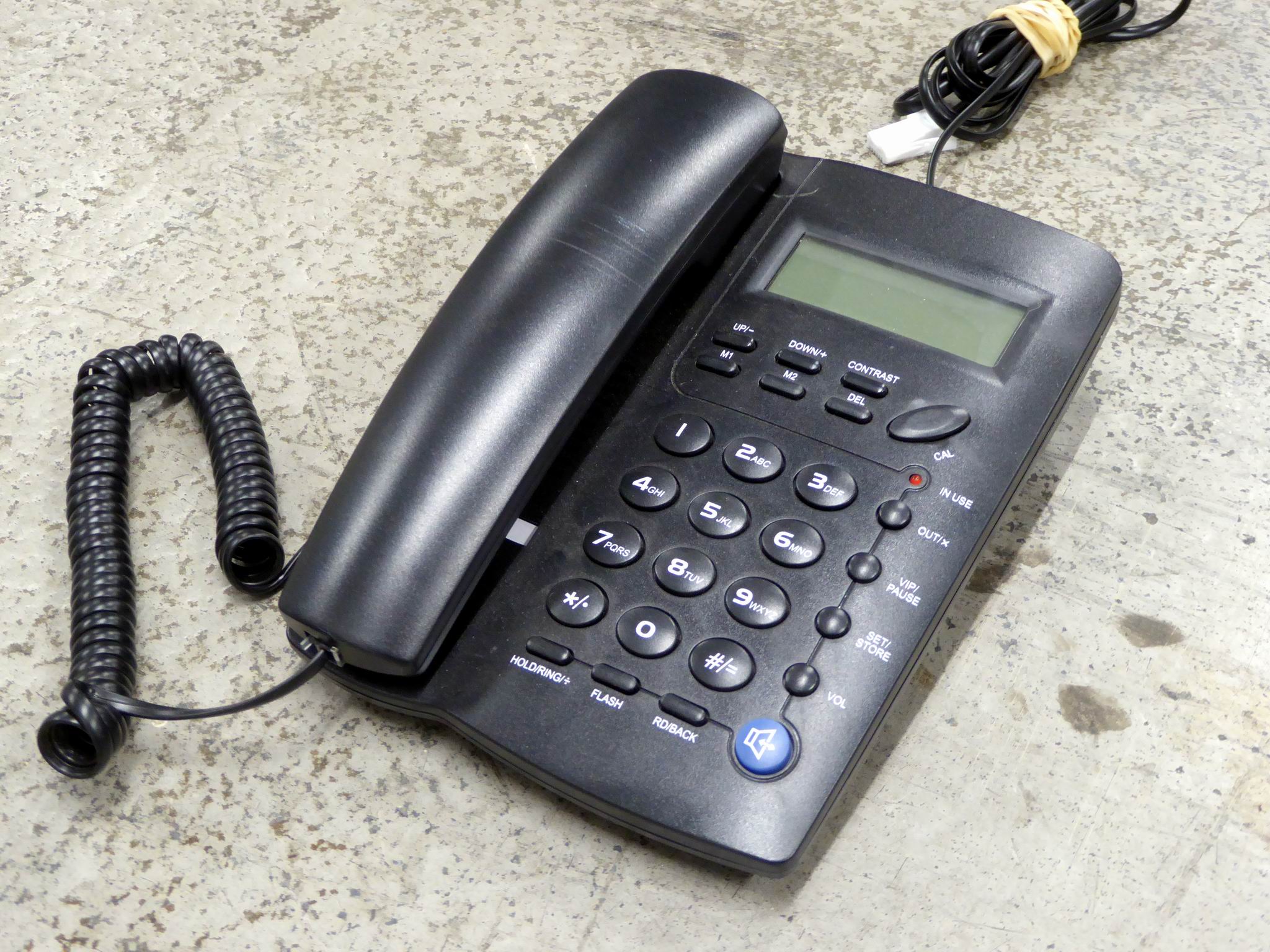 Sleek black office telephone | Electro Props Hire