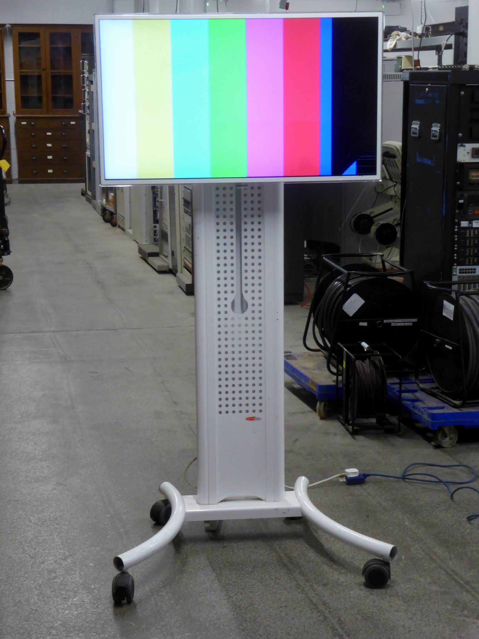 Large floor standing 40" flat screen monitor on wheeled trolley ...